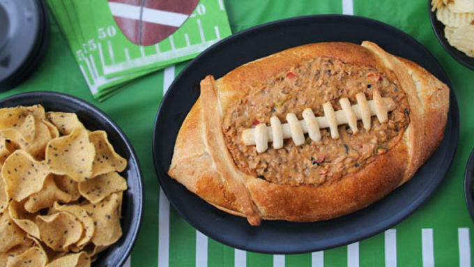 Taco Dip in a Football Bread Bowl Recipe - Tablespoon.com