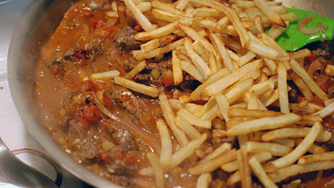 Peruvian Steak and French Fry Stir-Fry Recipe - Tablespoon.com