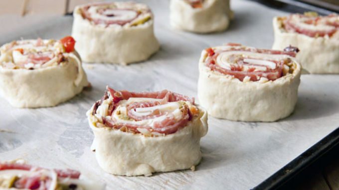 Muffuletta Pinwheels Recipe - Tablespoon.com