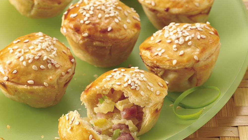 Tiny Ham and Pineapple Pot Pies recipe from Pillsbury.com