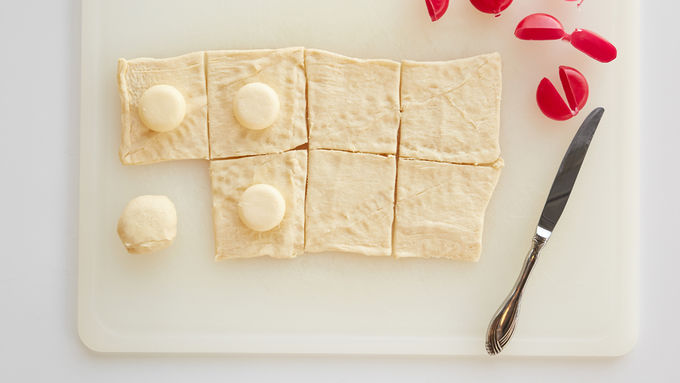 Crescent-Wrapped Baby Cheeses Recipe - Pillsbury.com