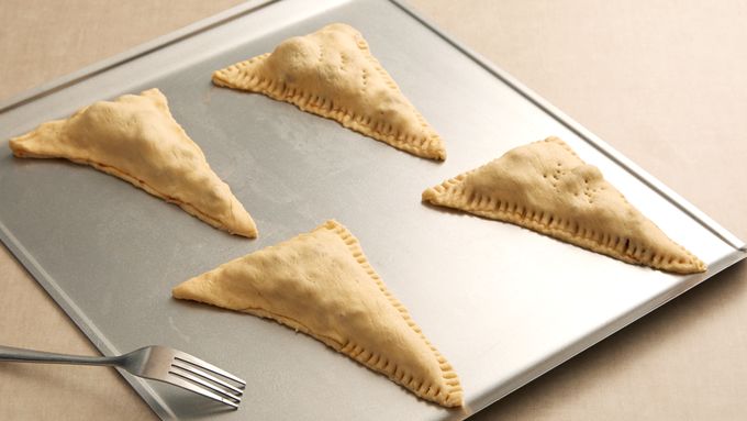 Taco-Stuffed Triangles Recipe - Pillsbury.com