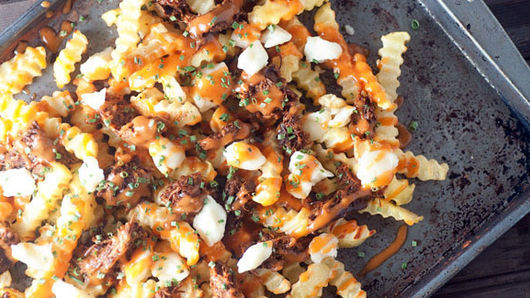 Pulled Pork Poutine Recipe - Tablespoon.com